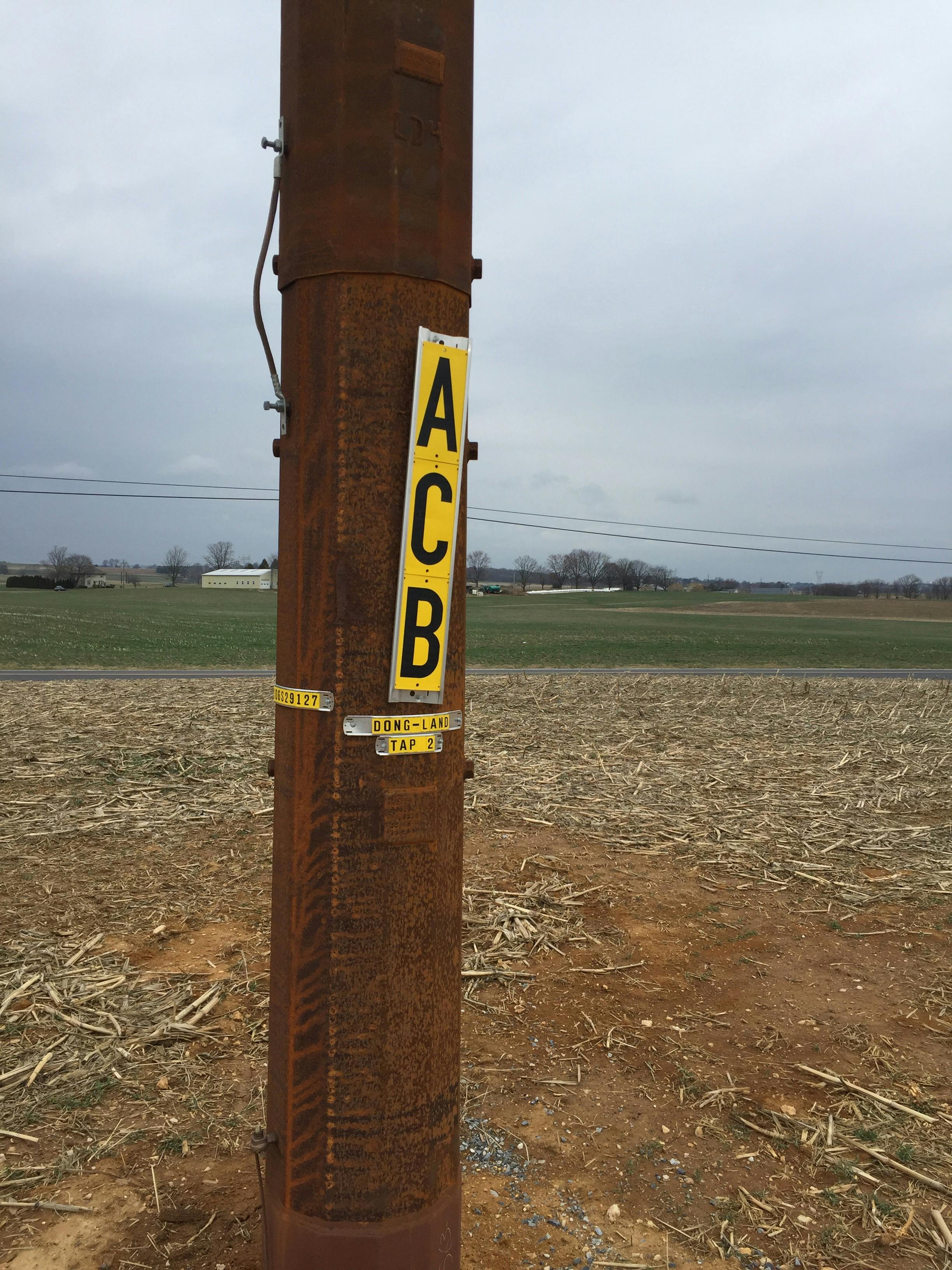 Signs up Above: Assuring Transmission Tower Safety with Highly Visible ...