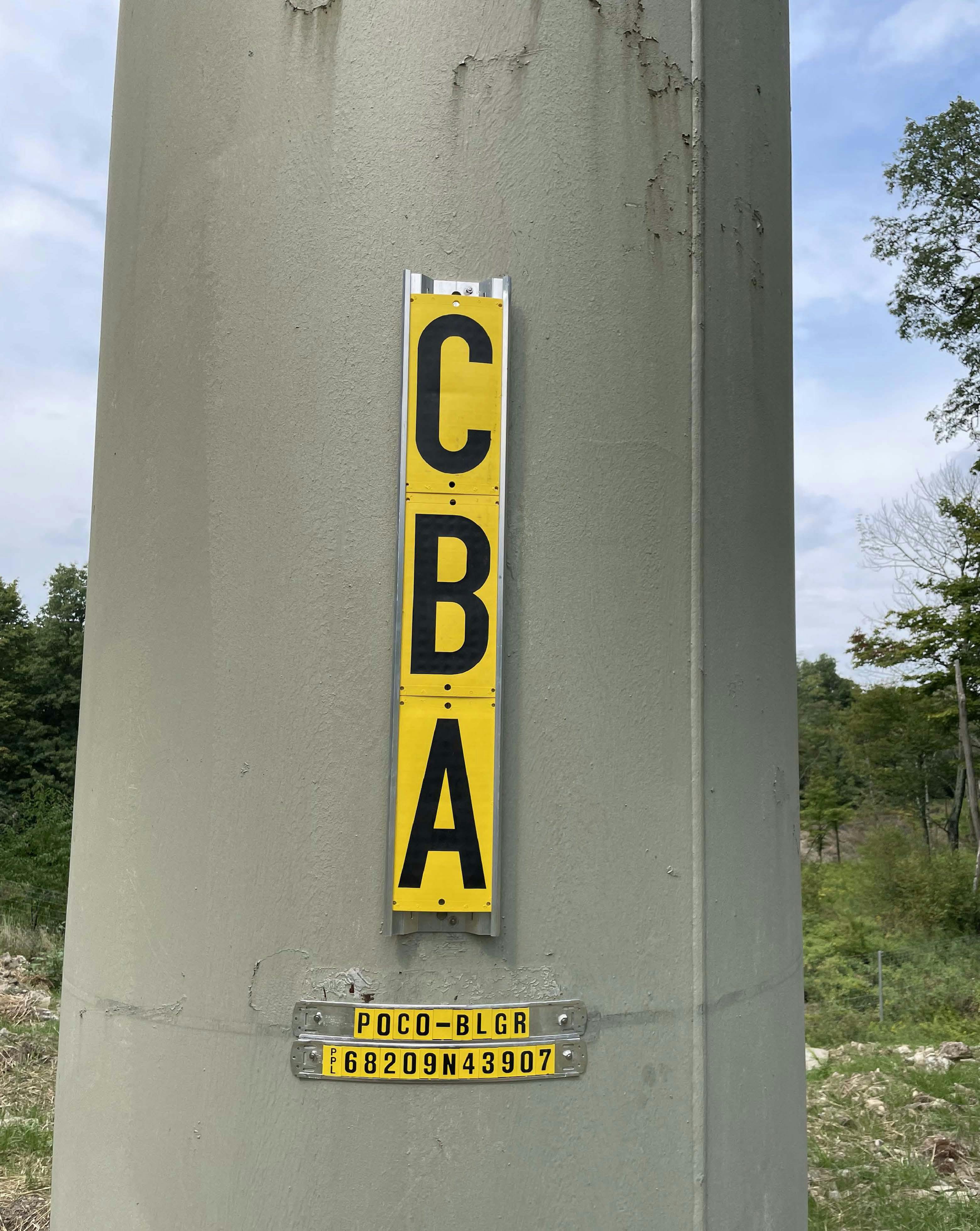 Signs up Above: Assuring Transmission Tower Safety with Highly Visible ...